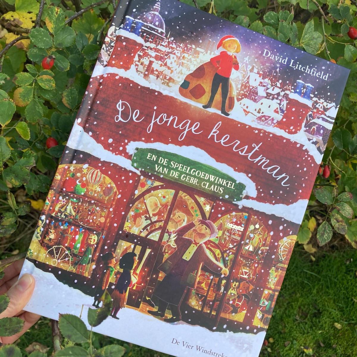 De jonge kerstman en de speelgoedwinkel van de Gebr. Claus – David ...